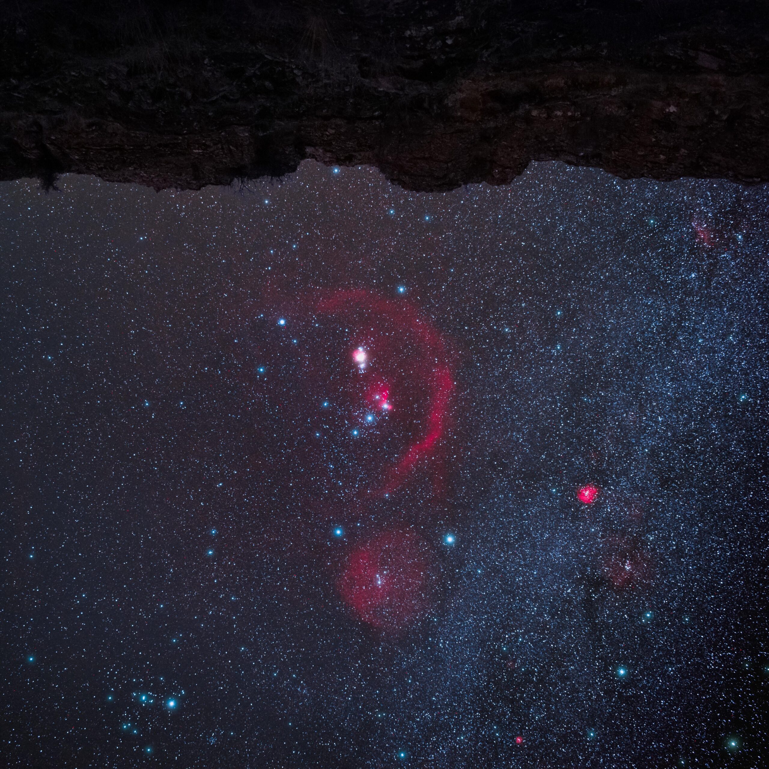 Upside down photo of the Orion Constellation. The big question mark ...