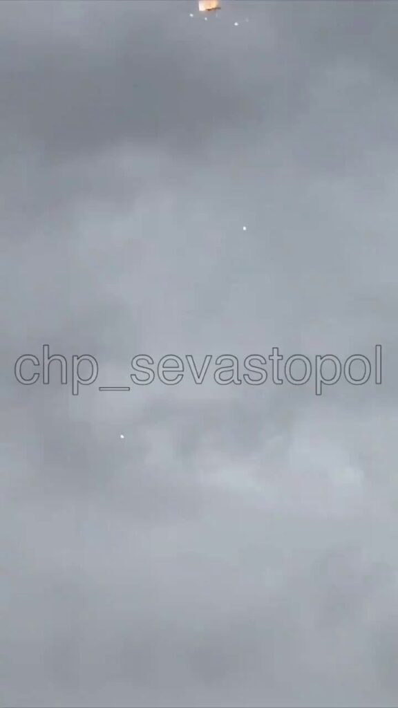 Russian jet falling down with three beams of light falling in sync with ...