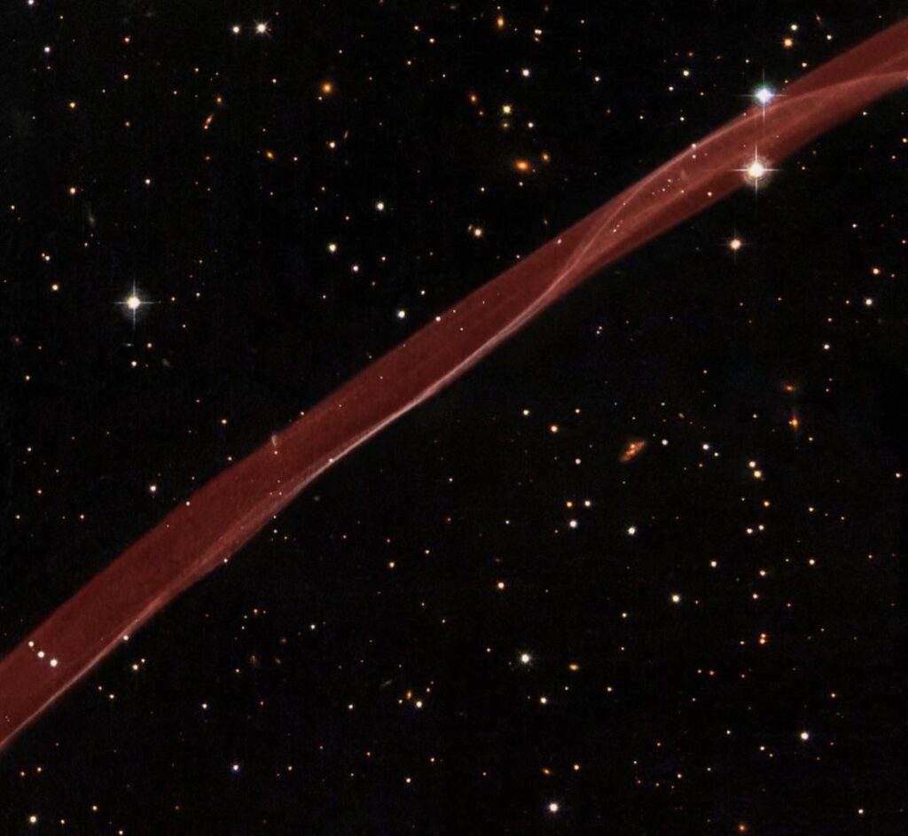 Red Ribbon crossing the cosmos captured by NASA Hubble - UFO FEED
