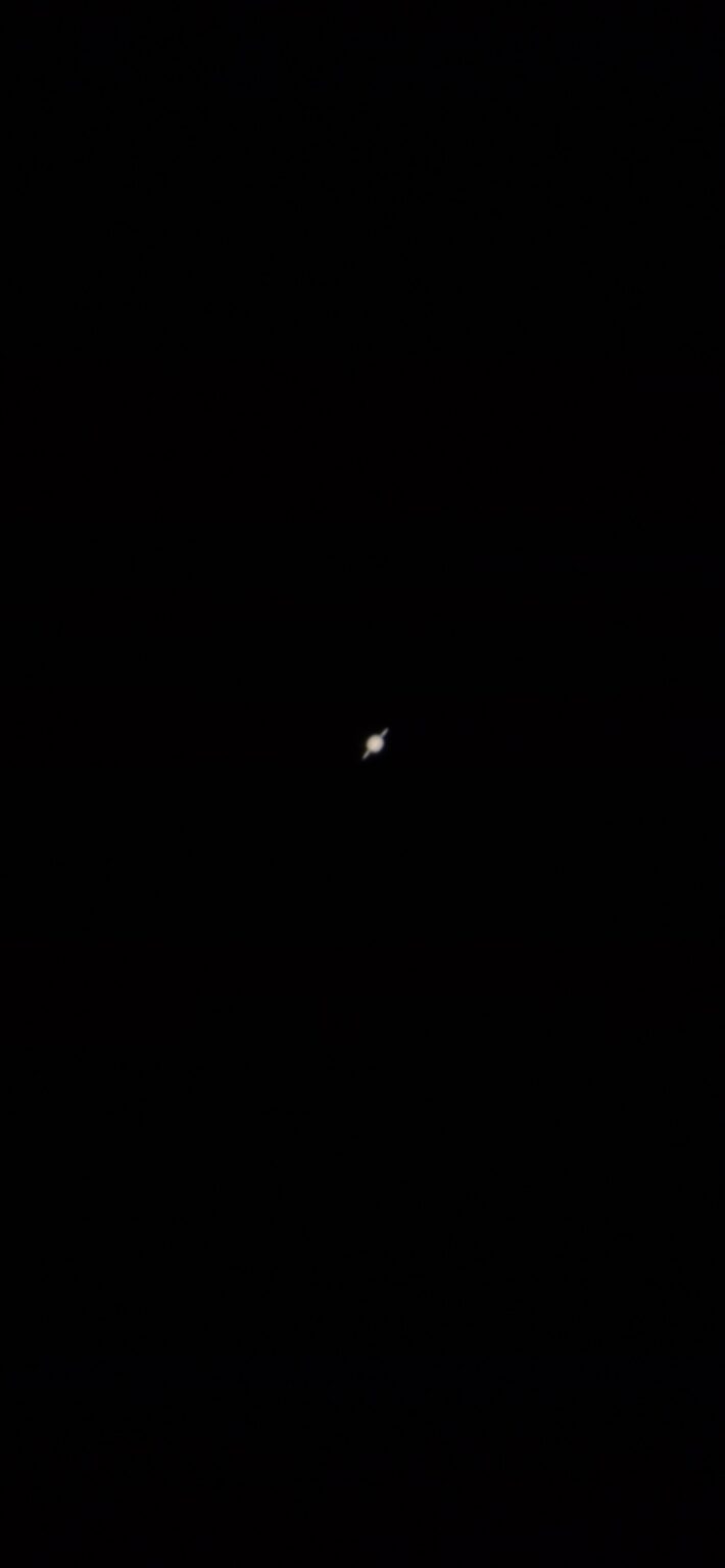 Saturn from my phone while fumbling to hold it against my telescope ...