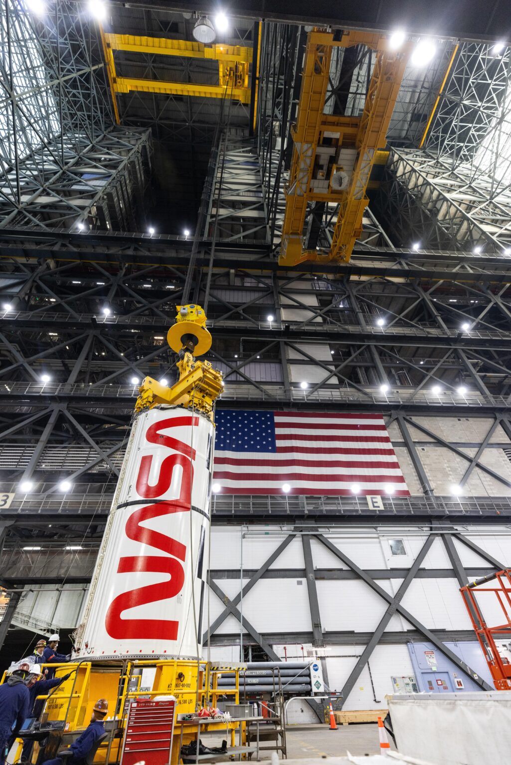 Stacking the left center center booster segment on the Artemis II Space ...