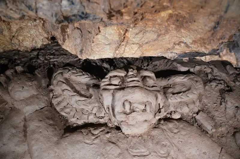Millennia-old raw clay sculptures in a cave in Mexico. Raw clay ...