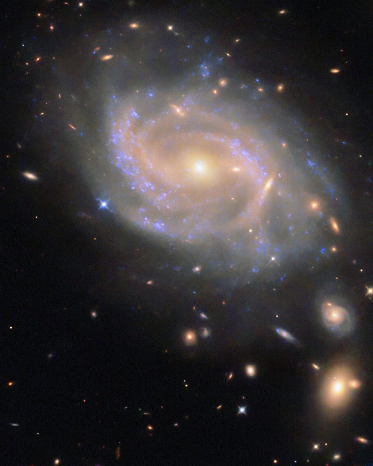 The swirling spiral galaxy in this NASA/ESA Hubble Space Telescope ...