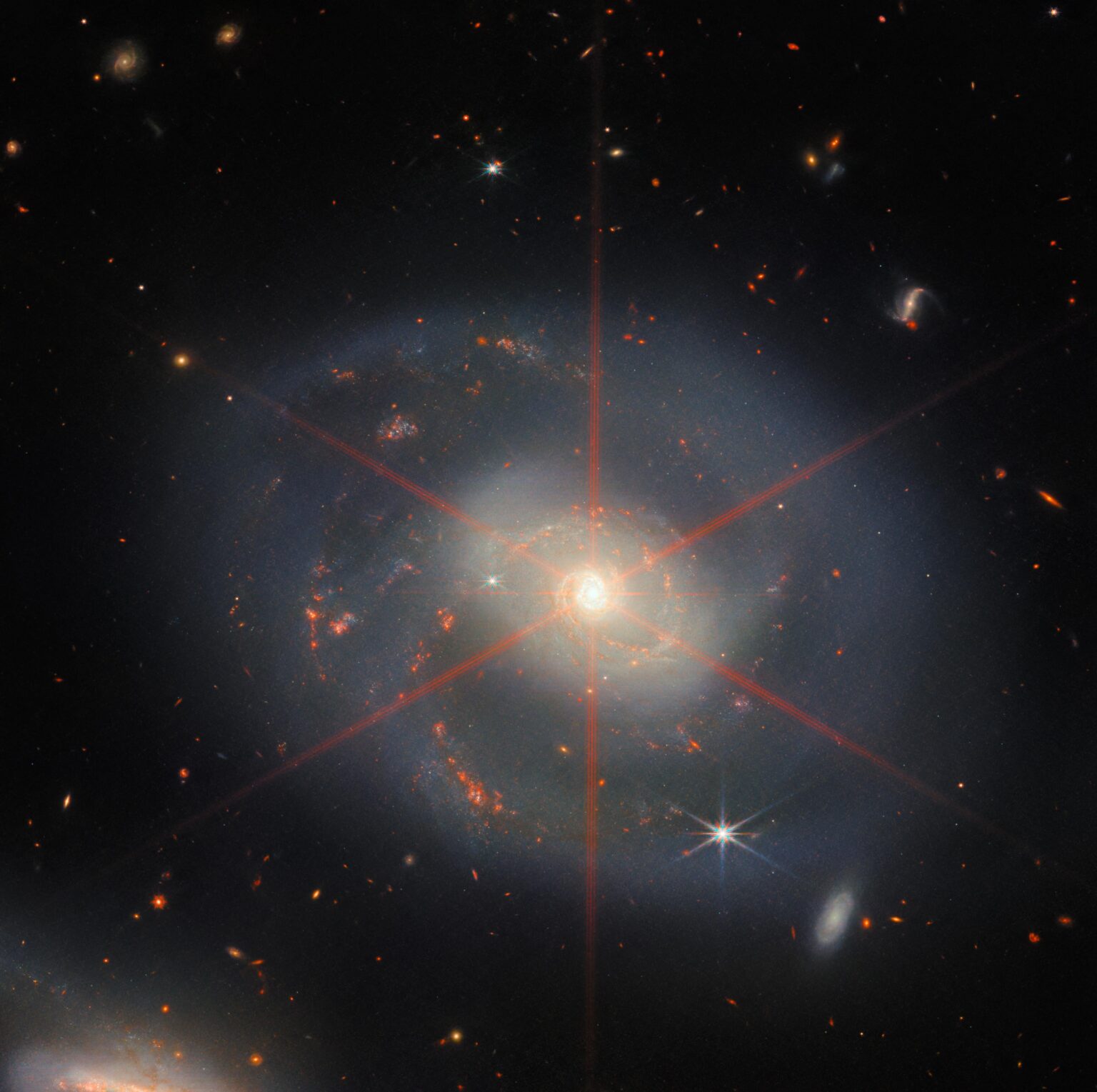 NGC 7469 as imaged by the James Webb Space Telescope. The bright ...
